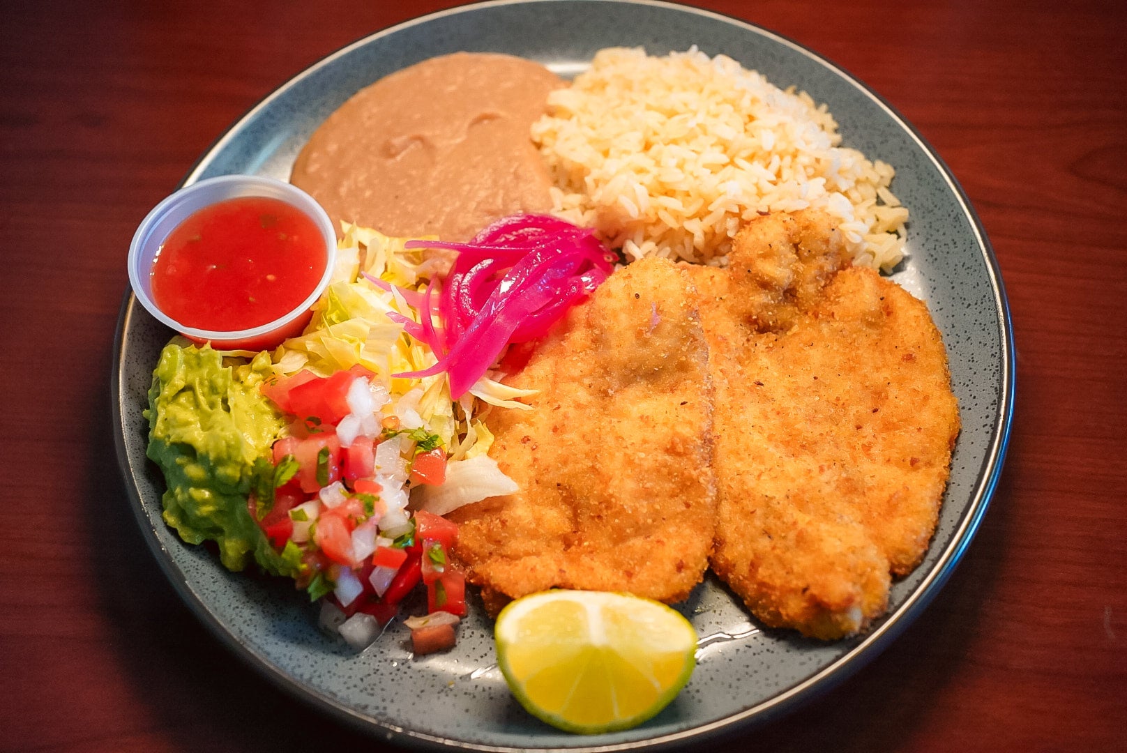 Milanesa de pollo (breaded chicken) Plate | YUCATAN TACOS